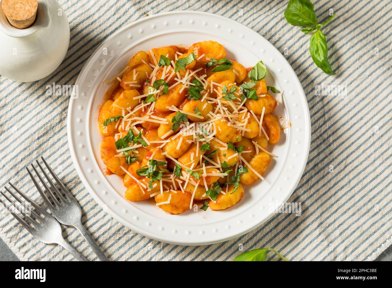 Homemade Italian Tomato Gnocchi Pasta with Cheese and Basil Stock Photo ...