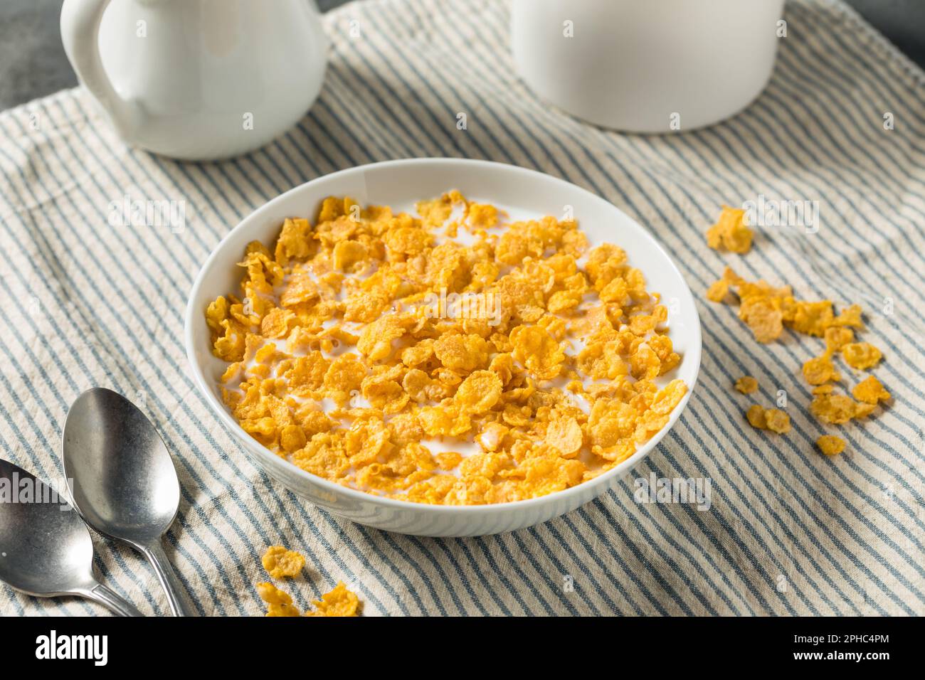 Homemade Healthy Corn Flakes Cereal with Whole Milk Stock Photo - Alamy