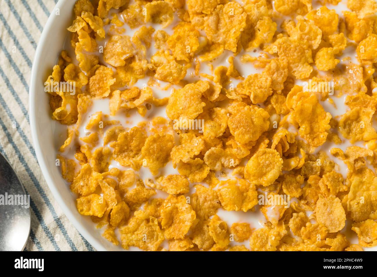 Homemade Healthy Corn Flakes Cereal with Whole Milk Stock Photo - Alamy