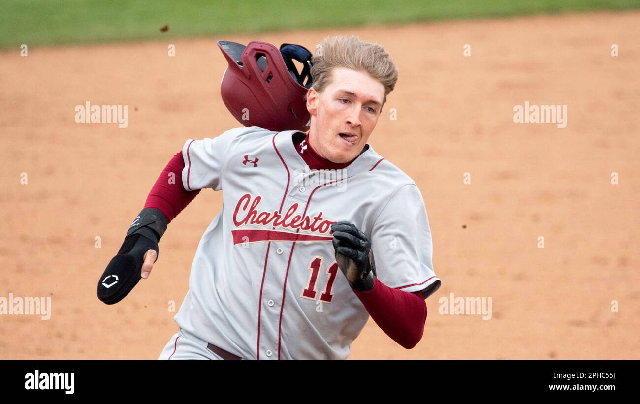 College of Charleston utility player Cole Mathis (11) rounds third base ...