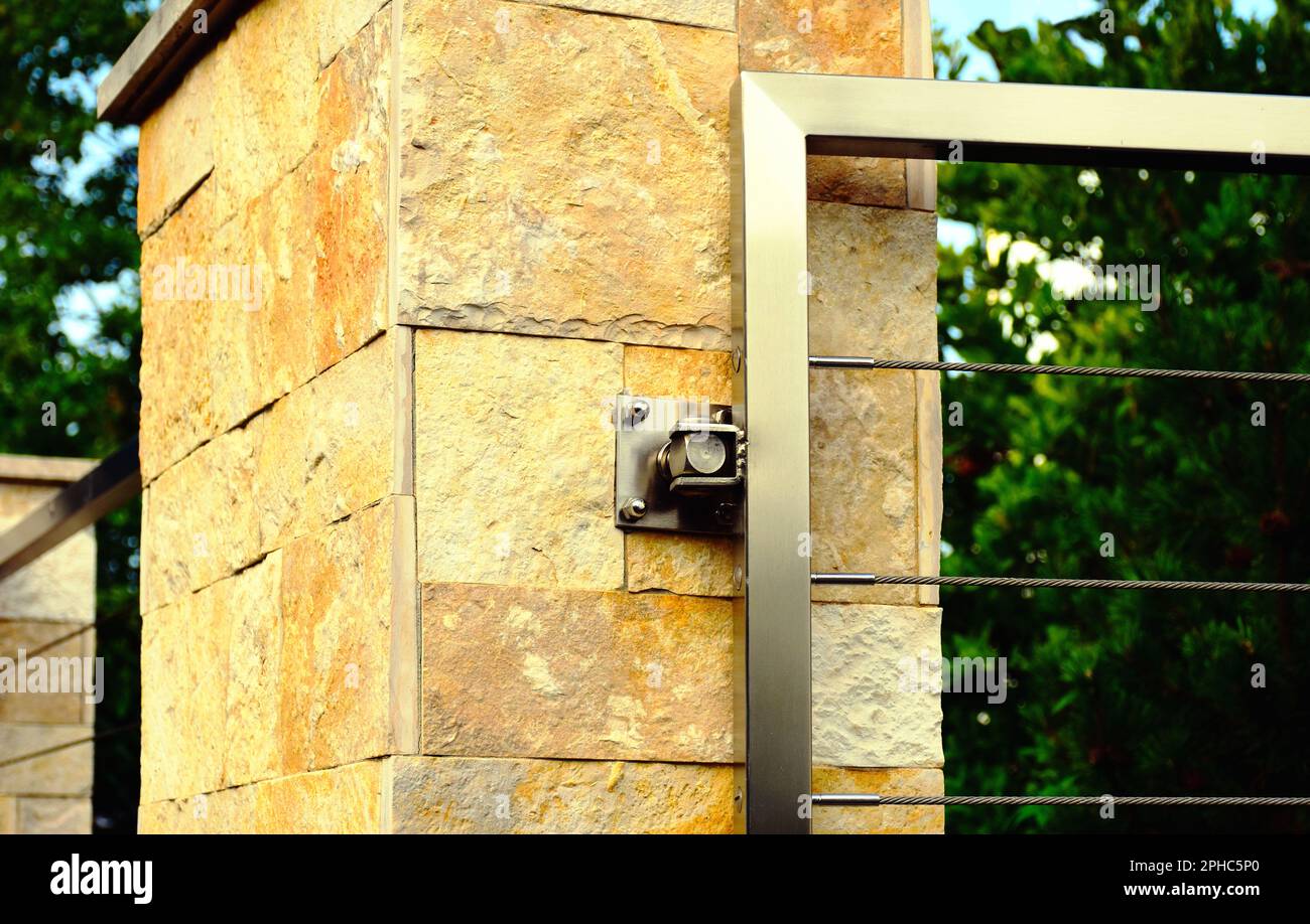 natural stone fence post. pier with stainless steel gate and hinge ...