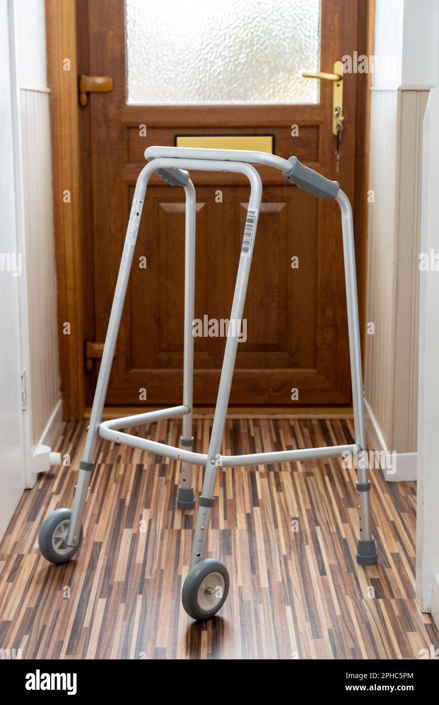 A zimmer frame in a hall way of a house Stock Photo - Alamy