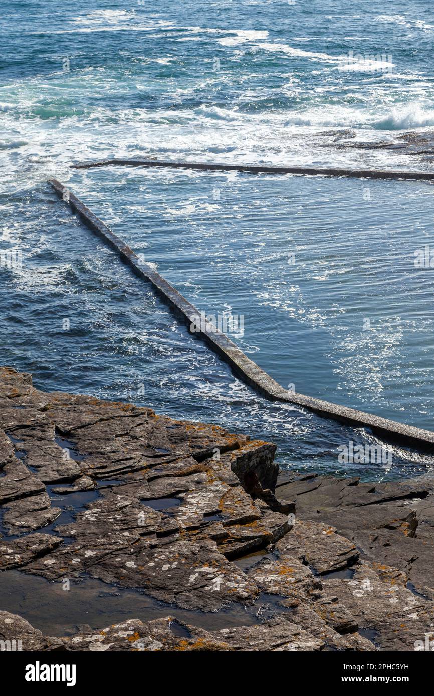 Waves at the wall of The Trinkie an outside swimming pool near Wick ...