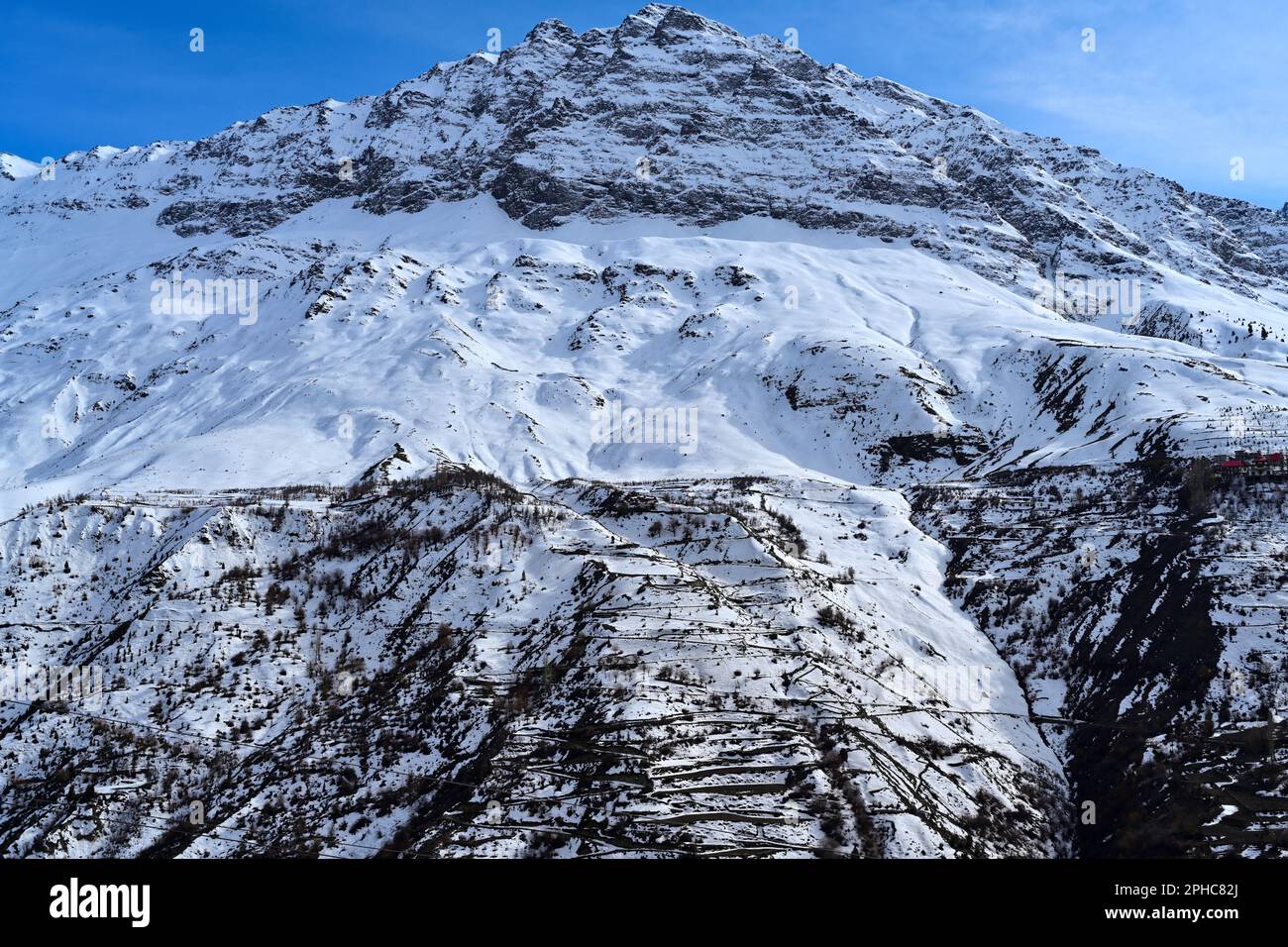 Mountain belly loaded with fresh snow Stock Photo - Alamy