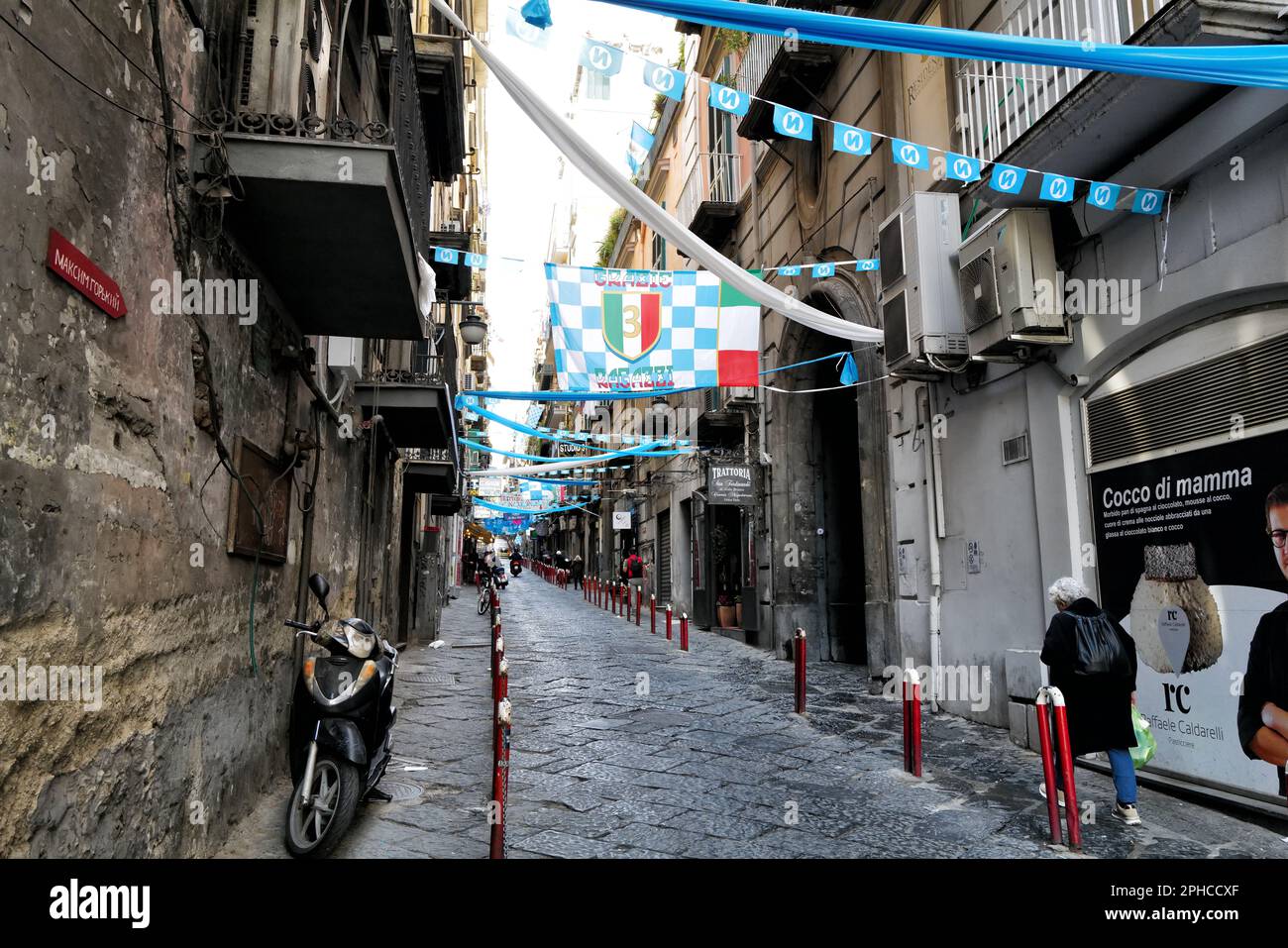 Flags and streamers in a street of Naples (Italy), as the city prepares ...