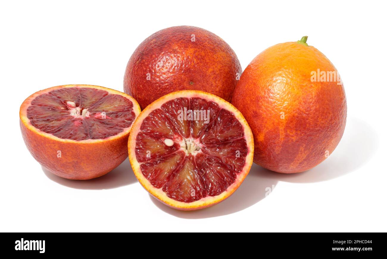 Whole and half red orange on white isolated background, delicious ...
