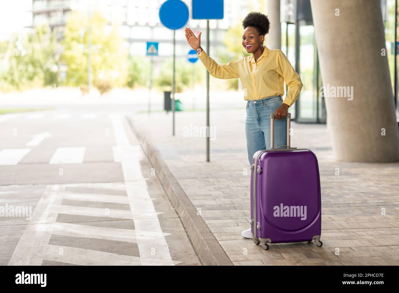 Black Passenger Lady Waving Hand Catching Taxi Cab At Airport Stock ...