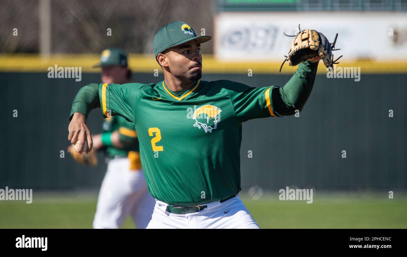 Norfolk St. infielder Justin Journette (2) makes a throw to first base ...