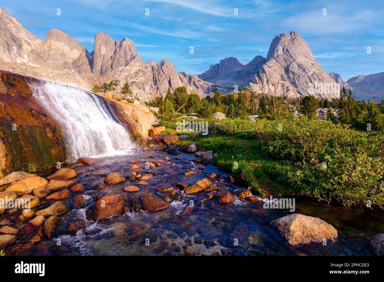 A Waterfall Among Steep Granite Mountains. Cirque of Towers, Wind River Range, Wyoming Stock ...