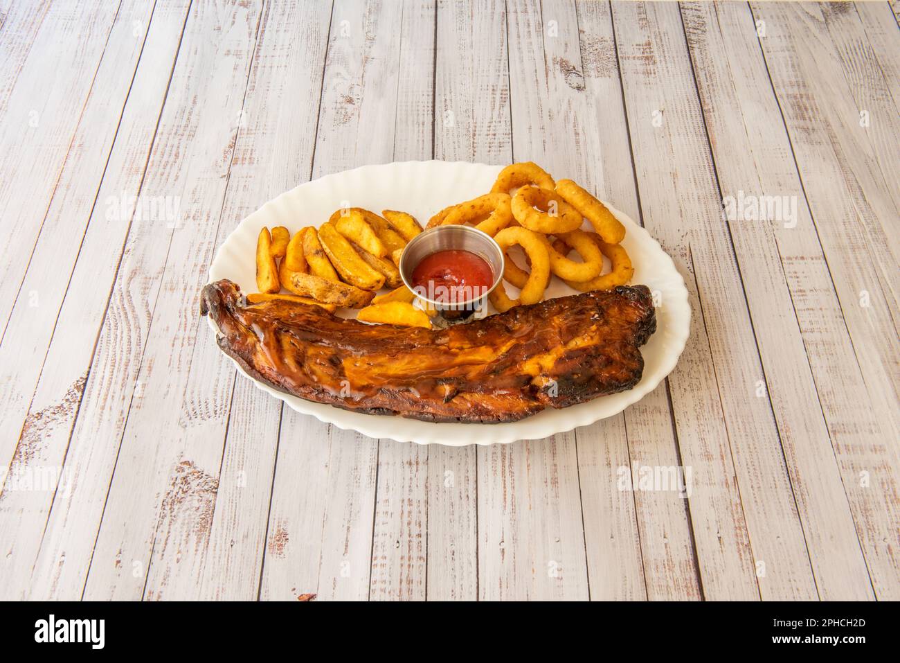 BBQ ribs are a classic of American gastronomy. Delicious pork ribs ...