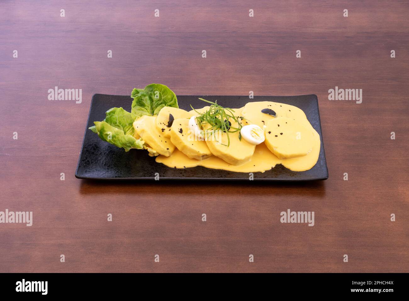 Papa a la huancaína is a typical starter of Peruvian gastronomy that ...