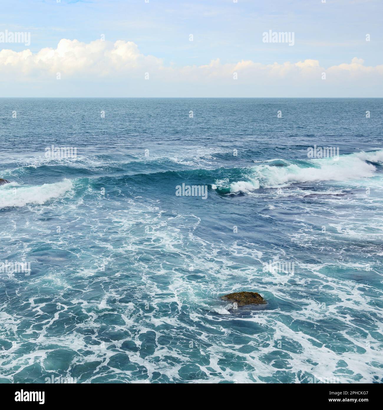 Beautiful ocean waves and blue sky Stock Photo - Alamy