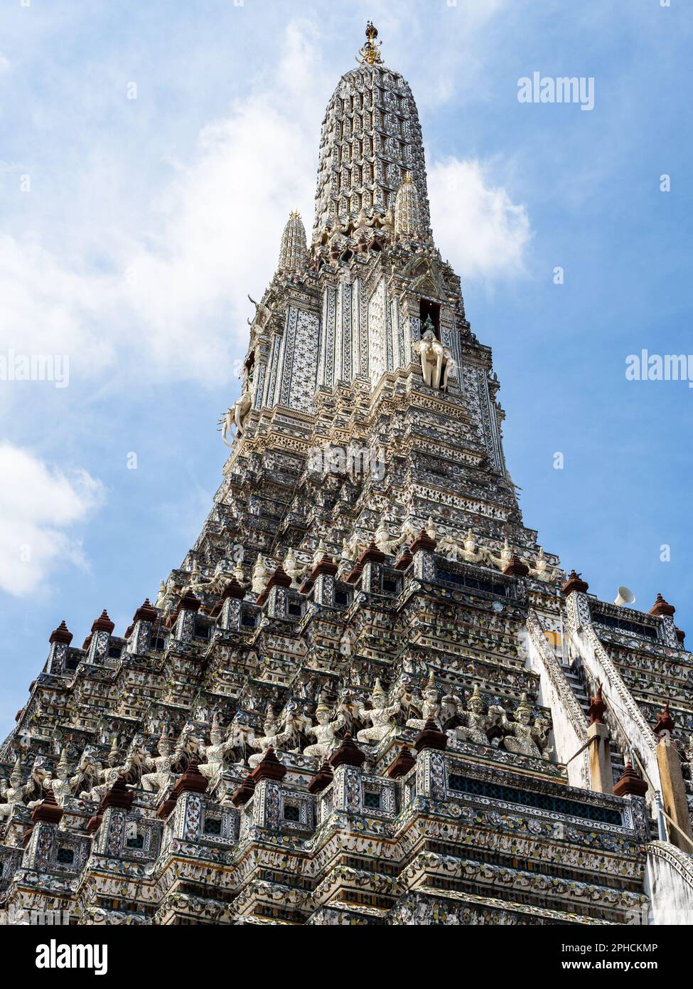 Rising majestically into the sky, the spire of Wat Arun Temple in ...