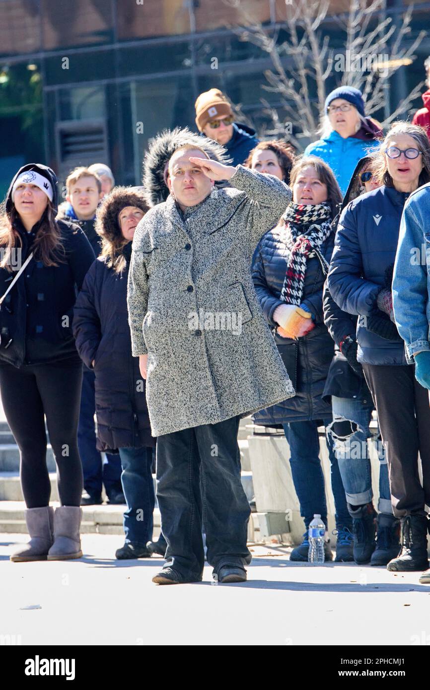 Edmonton, Alberta, Canada. 27th Mar, 2023. A man salutes during the ...