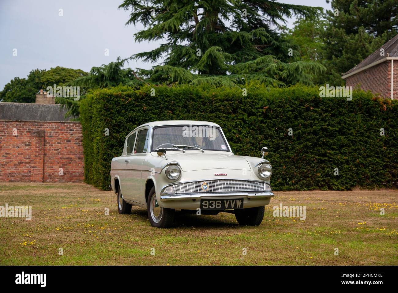 Ford Angial 1200 Delux two door saloon parked on grass in a walled ...