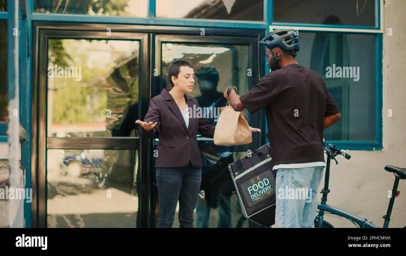 Aggressive client yelling at food delivery service worker, shouting ...