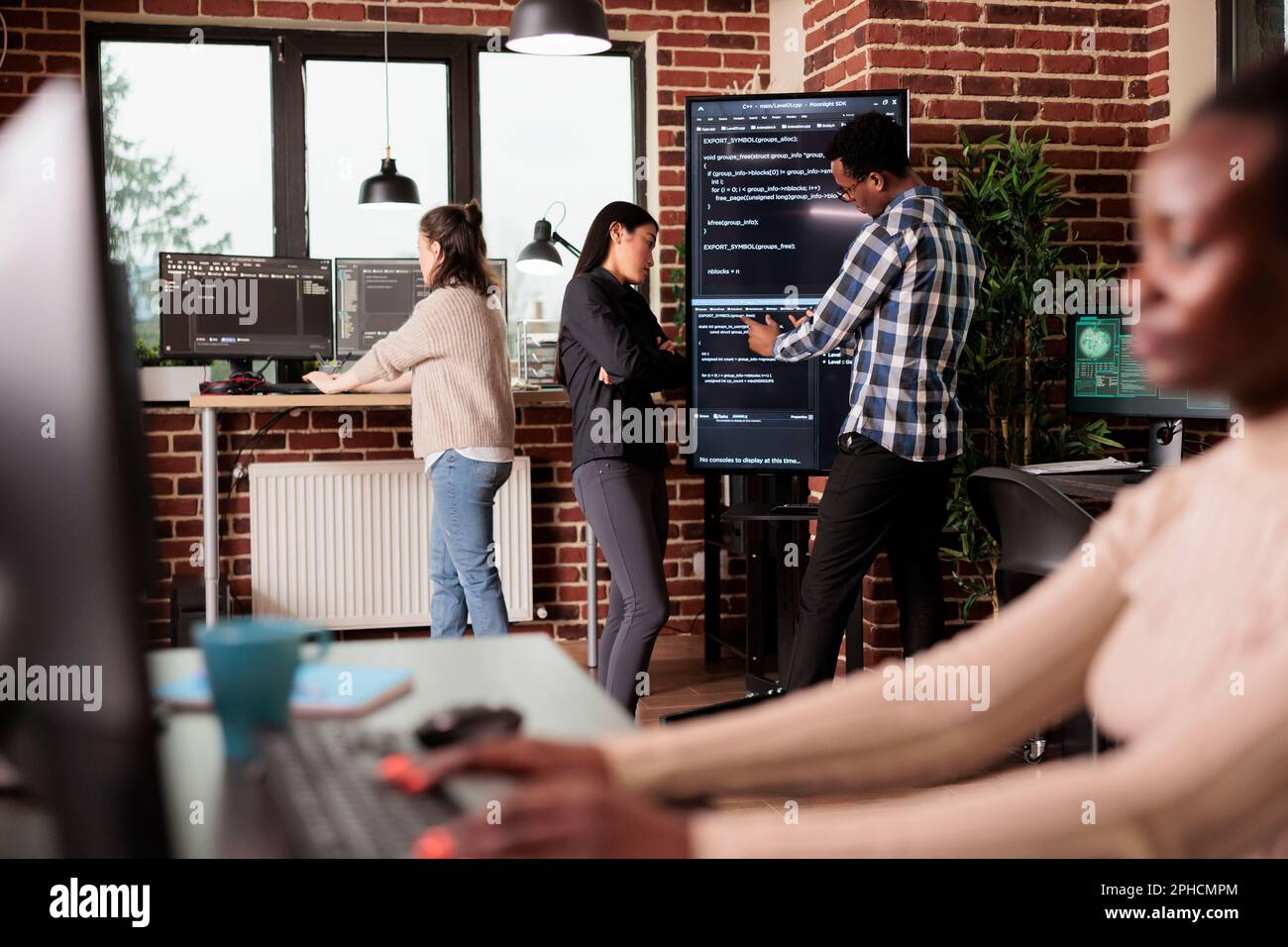 Tech Enginners Using Binary Code To Script Security System Programming Firewall Encryption