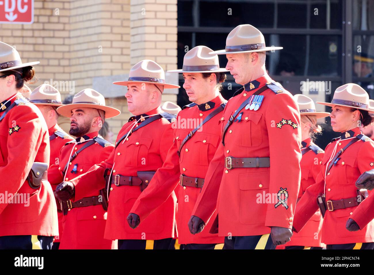 Edmonton, Alberta, Canada. 27th Mar, 2023. An RCMP officer becomes ...