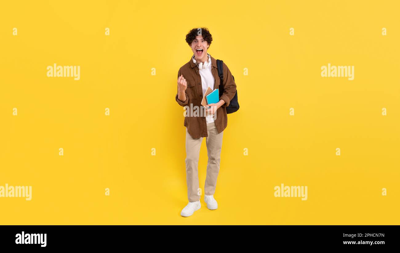 Emotional Student Guy Shouting Gesturing Yes Celebrating Luck, Yellow ...