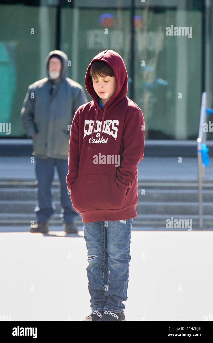 Edmonton, Alberta, Canada. 27th Mar, 2023. A young boy takes a moment ...