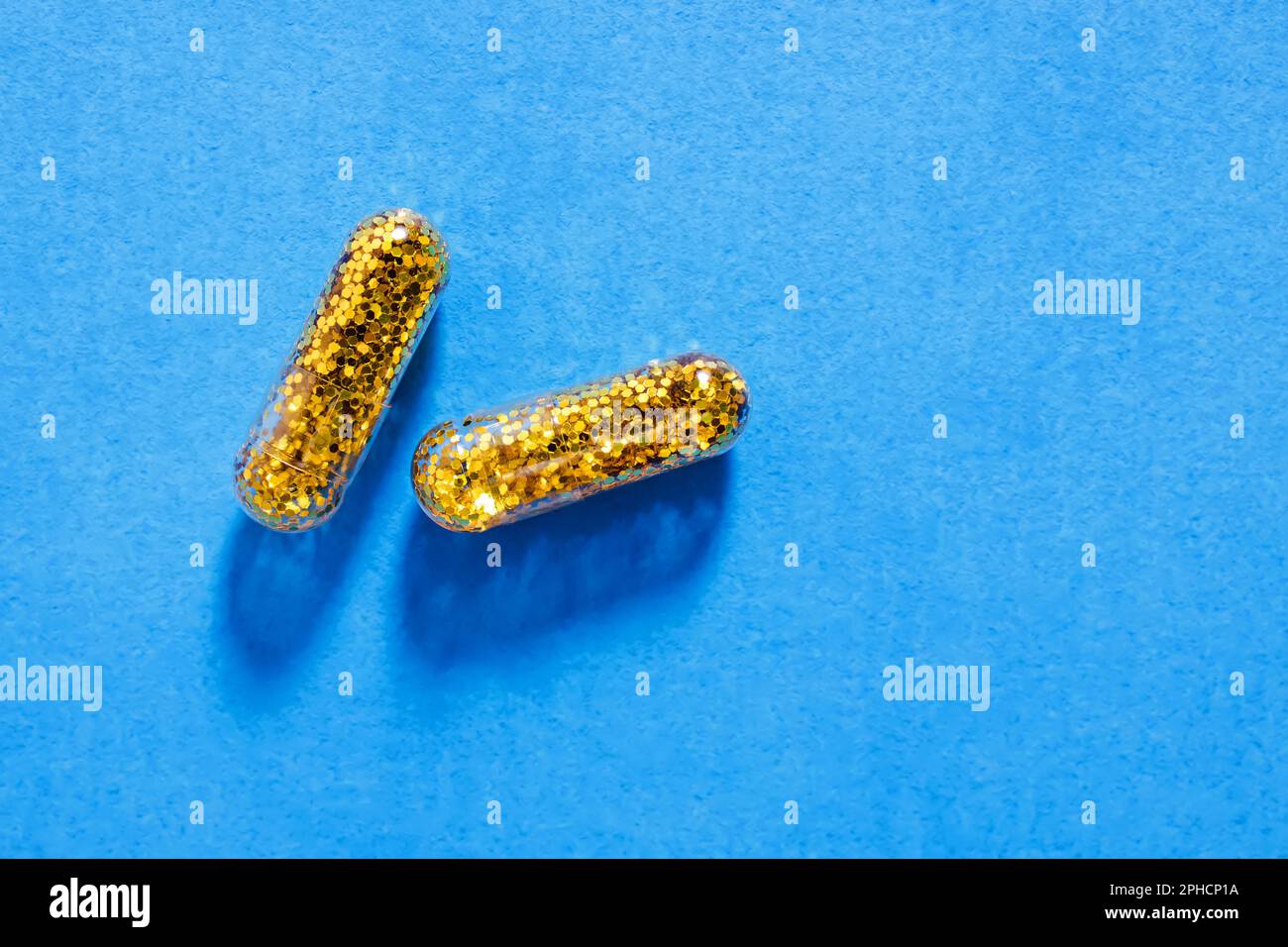 Gold pill glitter hi-res stock photography and images - Alamy