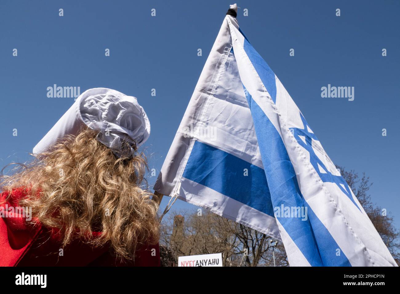 March 26, 2023, New York, New York, USA: A woman wears a Handmaid's ...
