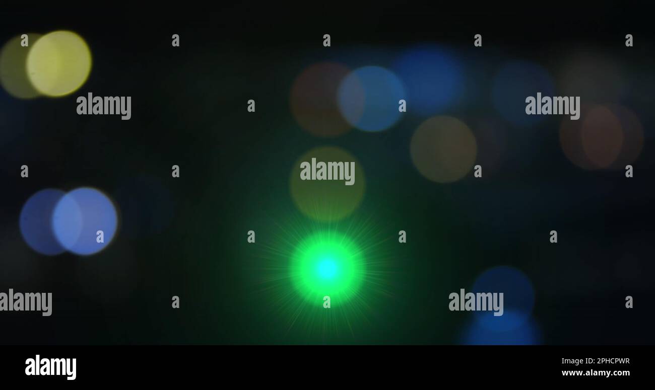 Comosition of traffic lights over light spots on black background Stock ...