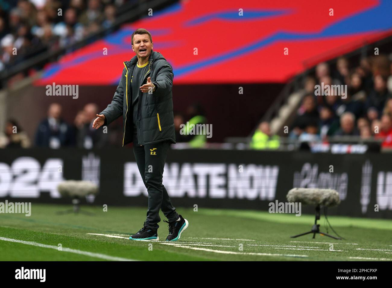 London, UK. 26th Mar, 2023. Ruslan Rotan, the head coach of Ukraine in ...