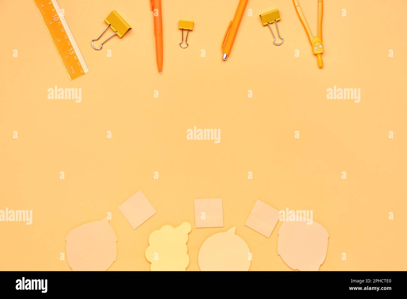 Frame made of sticky notes, pens and ruler on yellow background Stock ...