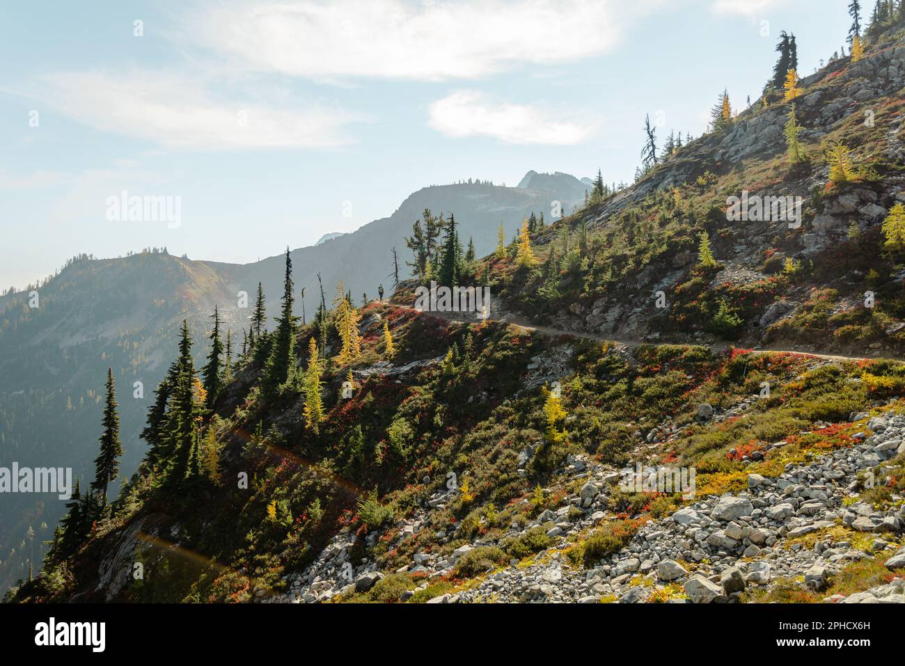 Woman hiking on Maple Pass trail in Cascades National Park Washington ...