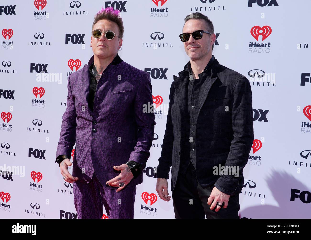 Jacoby Shaddix, left, and Jerry Horton of Papa Roach arrive at the ...