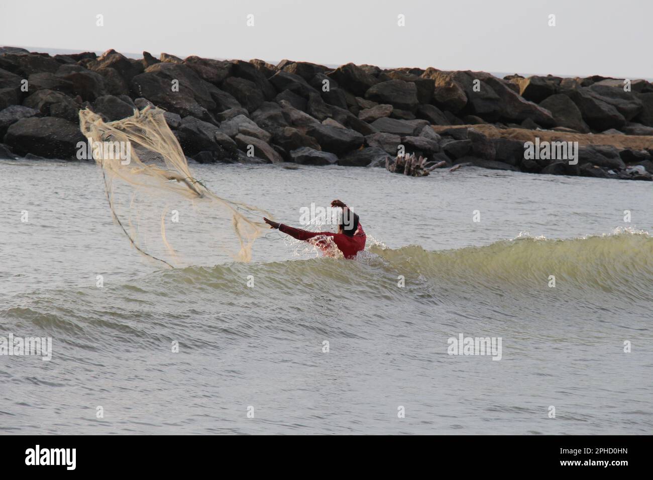 Throwing the net hi-res stock photography and images - Alamy