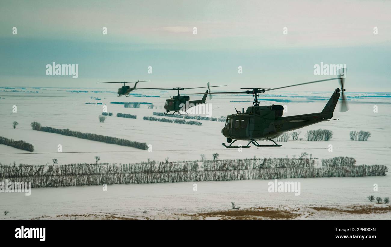 Three UH-1N Hueys assigned to the 54th Helicopter Squadron fly in ...
