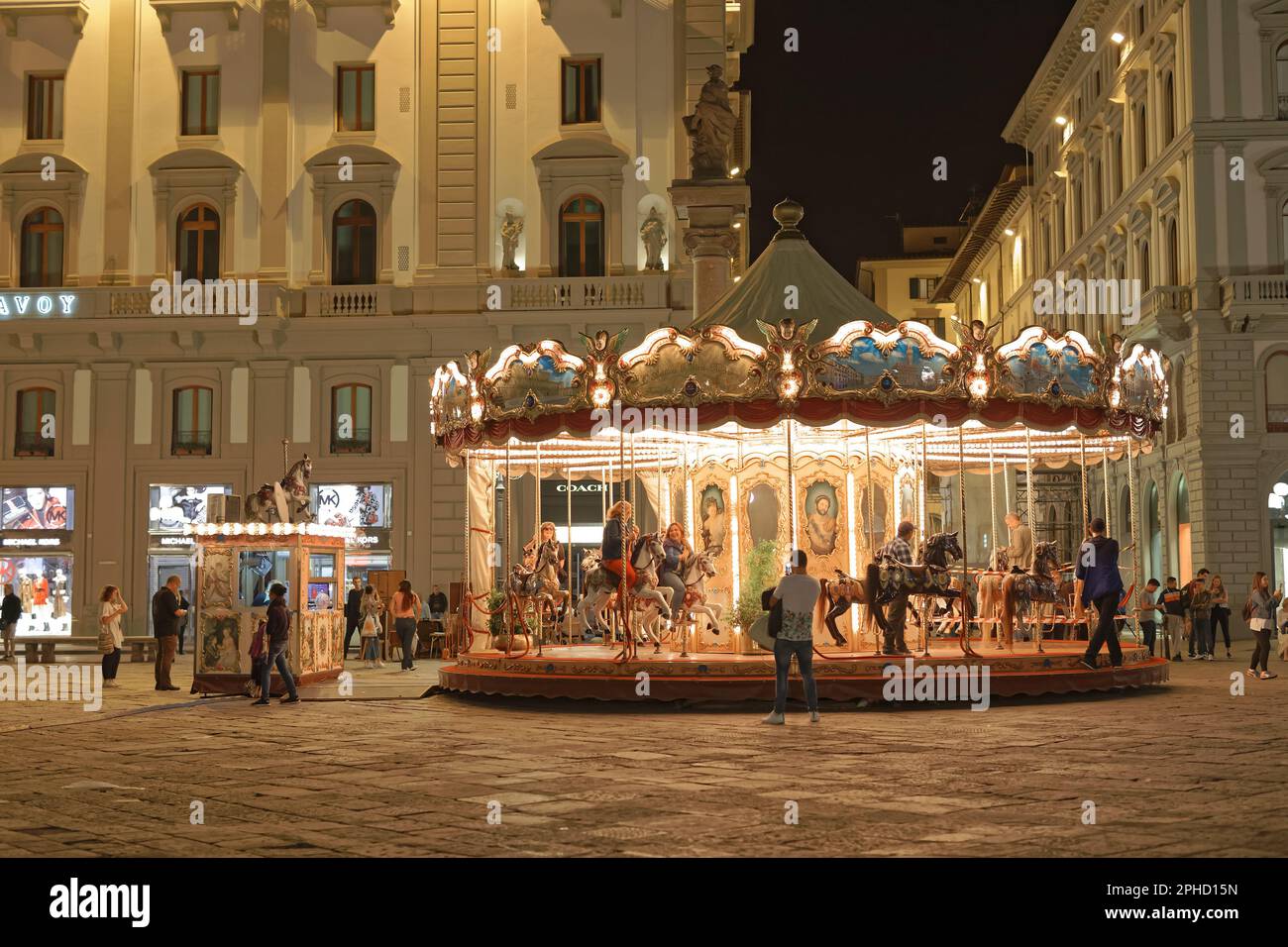 Fairground Carousel by night in Florence Italy Stock Photo - Alamy