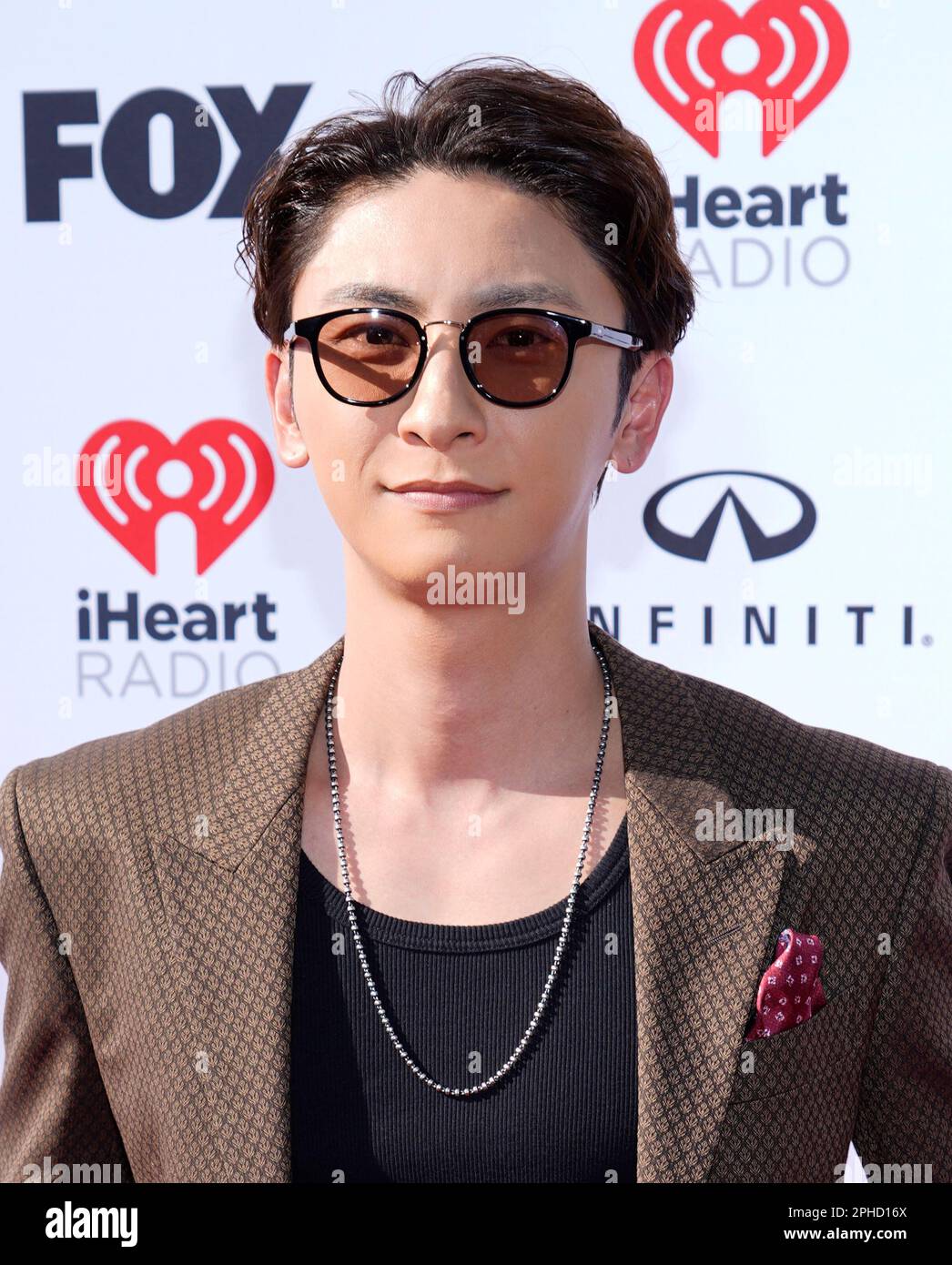 Shinjiro Atae arrives at the iHeartRadio Music Awards on Monday, March ...