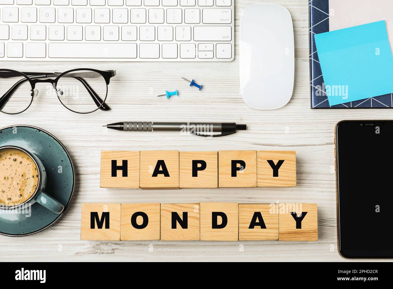 Flat lay composition with phrase Happy Monday made of cubes at ...