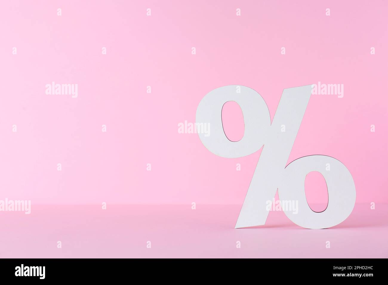 Paper percent symbol cutout on pink background. Space for text Stock ...