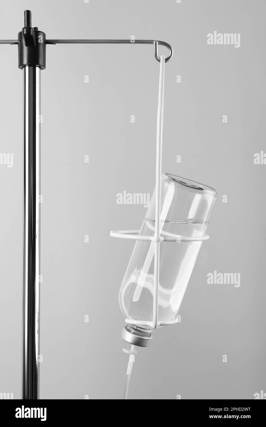 IV infusion set on light grey background Stock Photo - Alamy