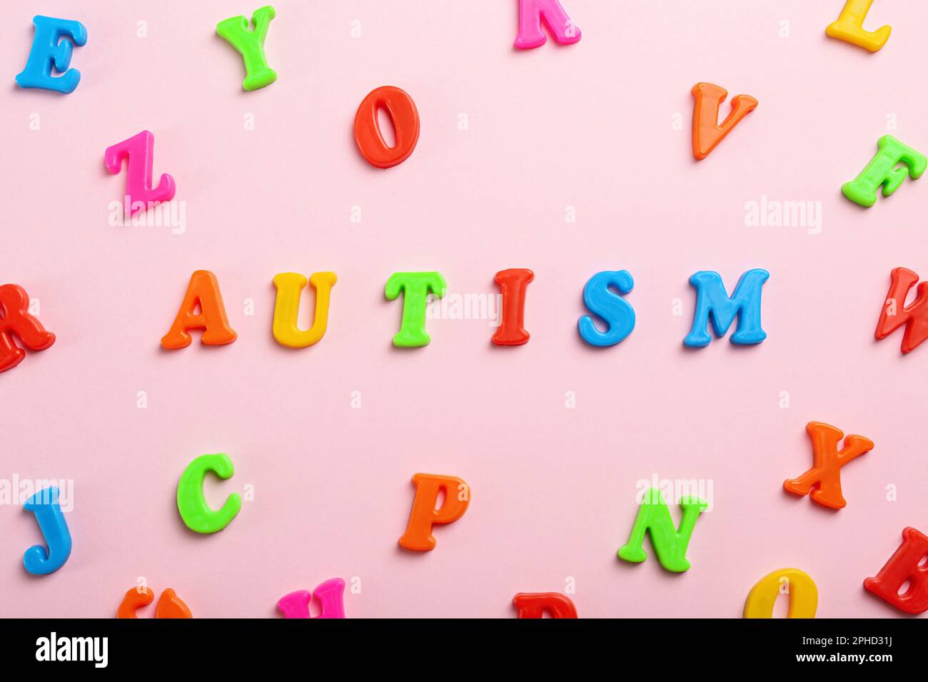 Flat lay composition with word Autism on pink background Stock Photo ...