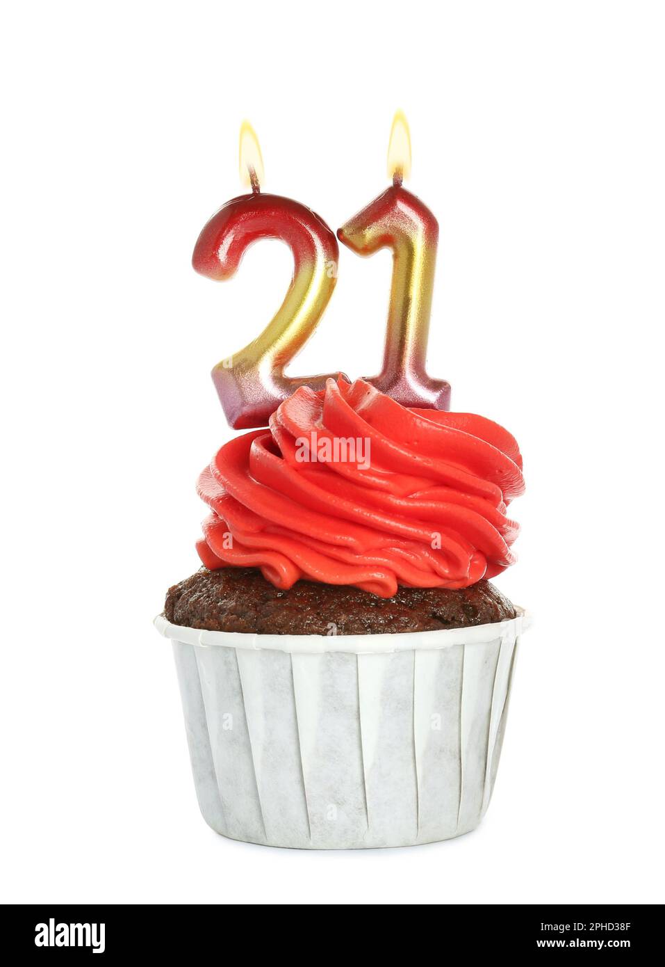Delicious cupcake with number shaped candles on white background ...