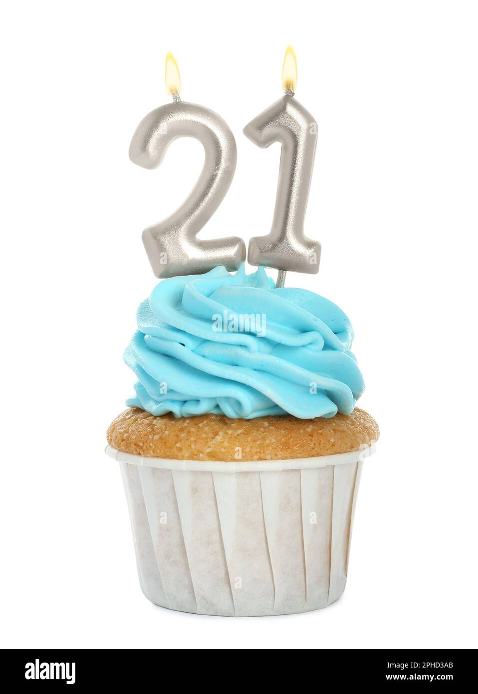Delicious cupcake with number shaped candles on white background ...