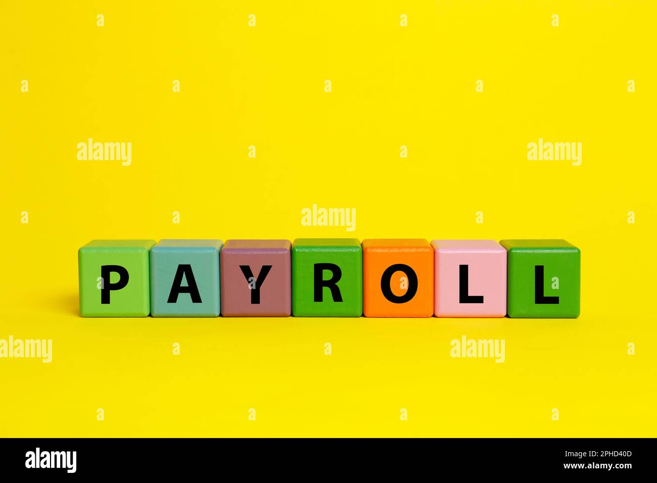 Colorful cubes with word Payroll on yellow background Stock Photo - Alamy