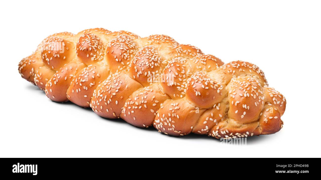 Homemade braided bread with sesame seeds isolated on white. Traditional ...