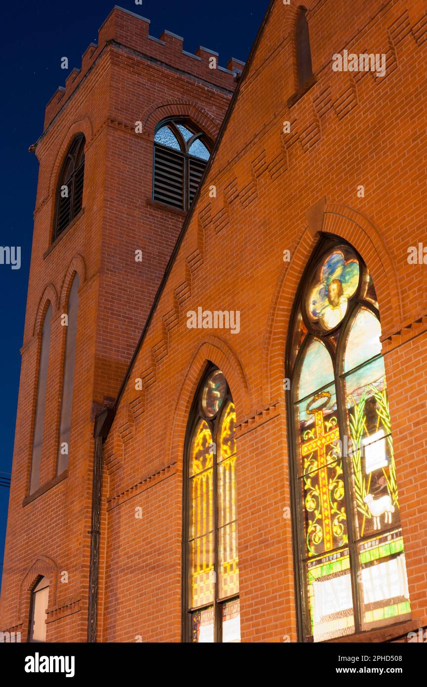 Brick church lit by moonlight Stock Photo - Alamy