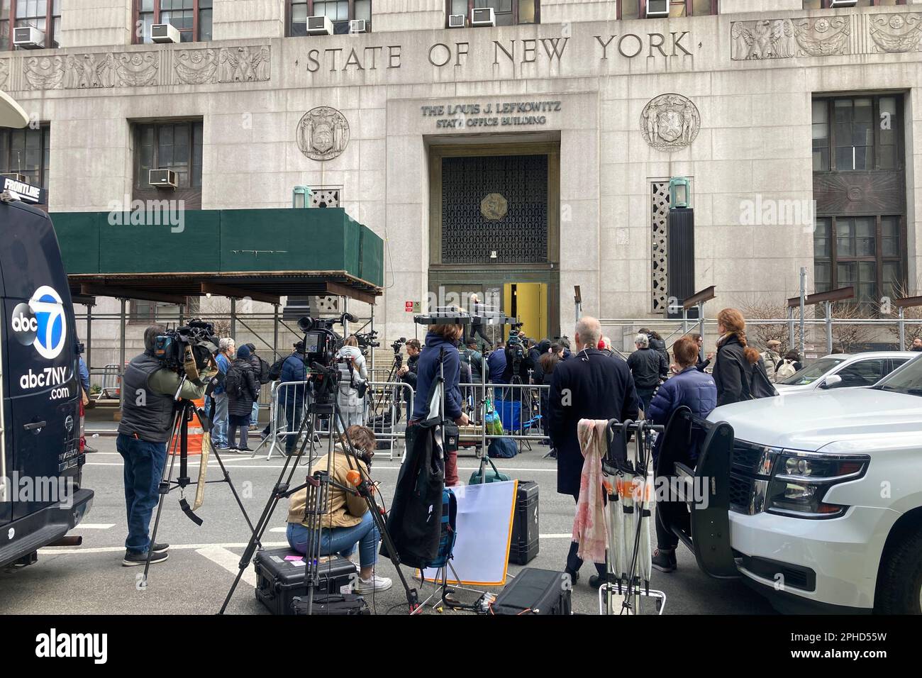 News media members wait outside the Louis J. Lefkowitz State Office ...