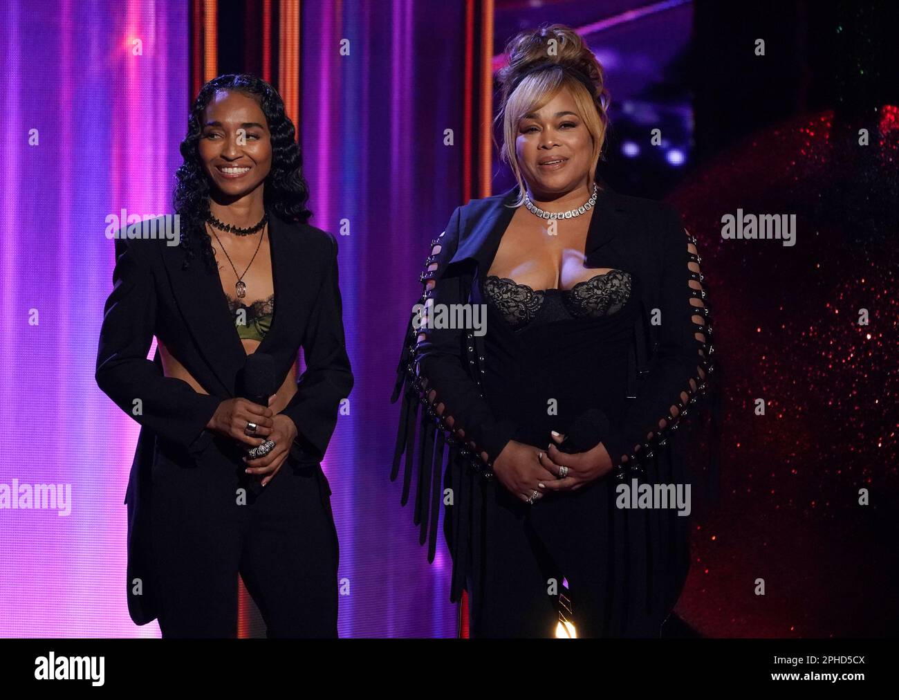 Chilli, left, and T-Boz, members of TLC, introduce a performance by ...