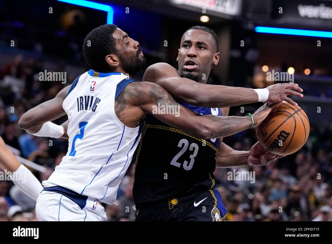 Dallas Mavericks guard Kyrie Irving (2) knocks the ball away from ...