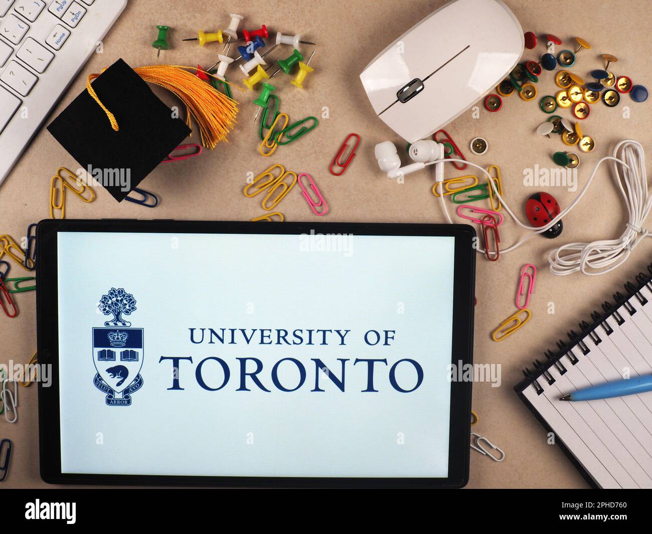 In this photo illustration, University of Toronto logo seen displayed ...