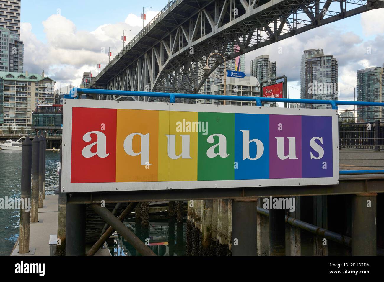 Aquabus ferrry sign on Granville Island with Granville Street Bridge ...
