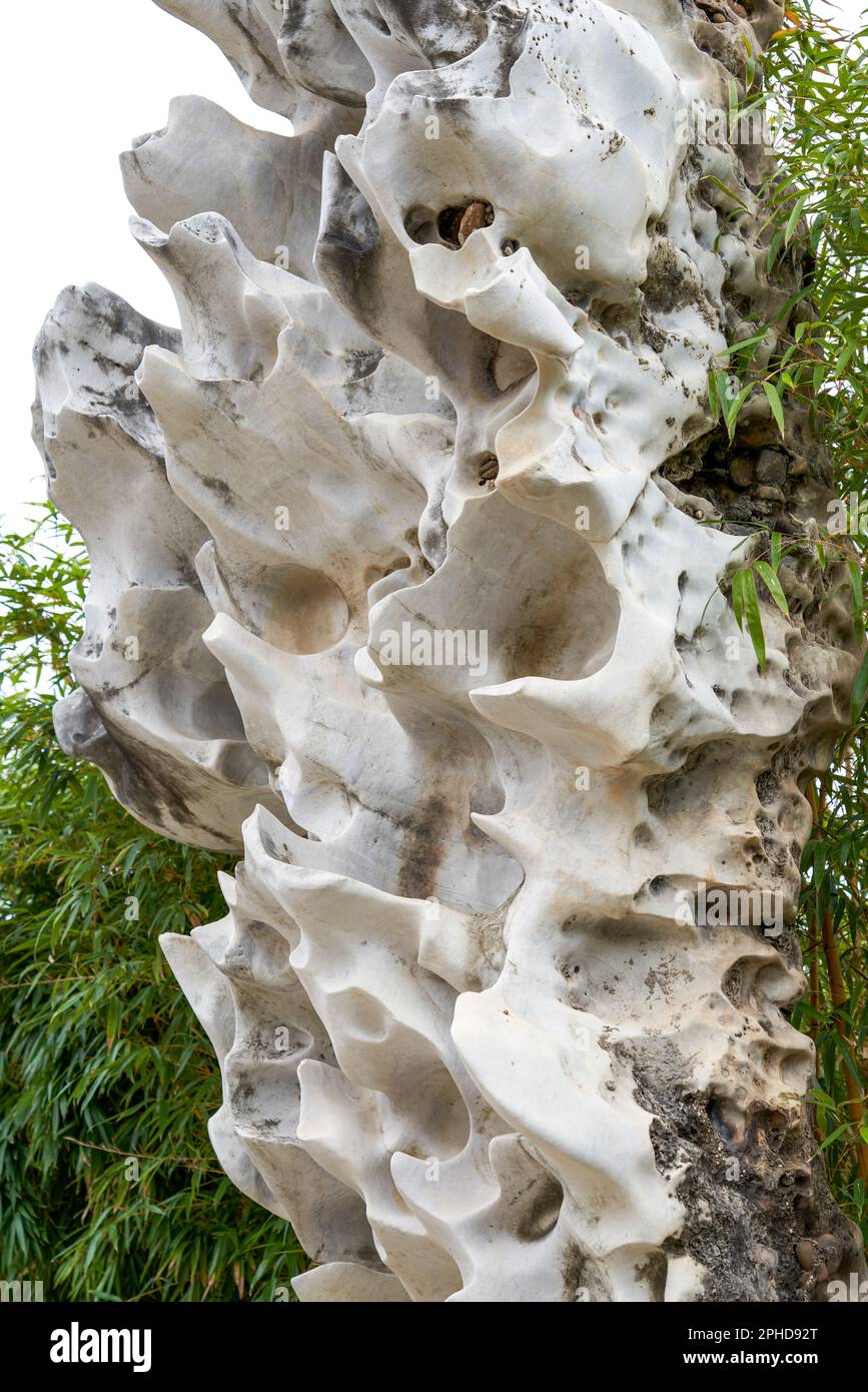 A huge rockery stone set in a japanese garden Stock Photo - Alamy